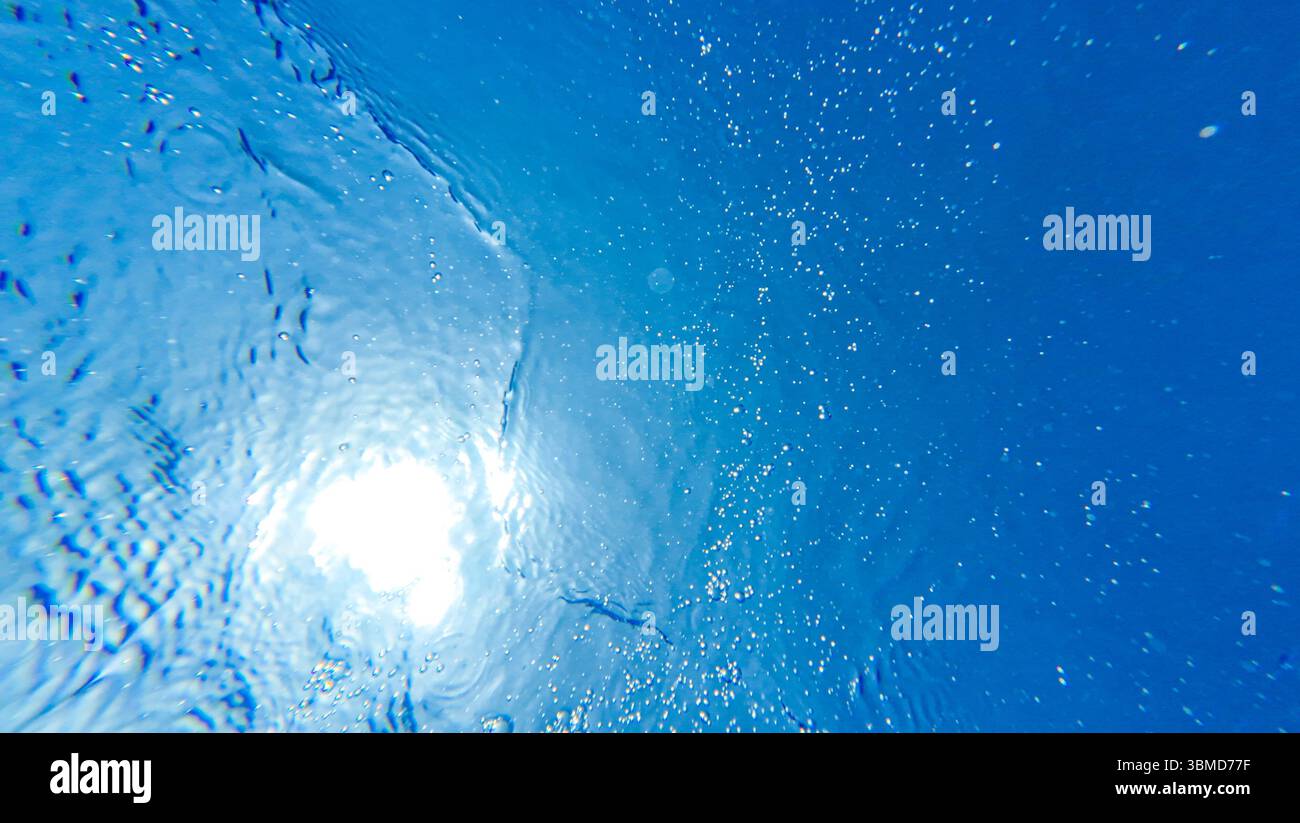 Underwater View with Sunlight and Bubbles Stock Photo - Alamy