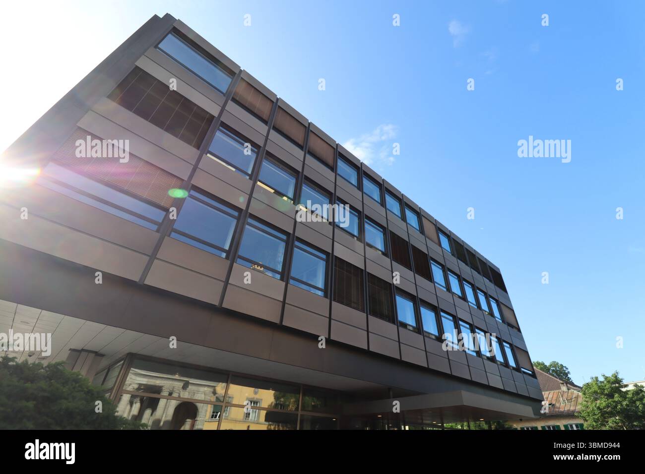 MUNICH, GERMANY - JUNE 24, 2025: Modern office building with reflective ...