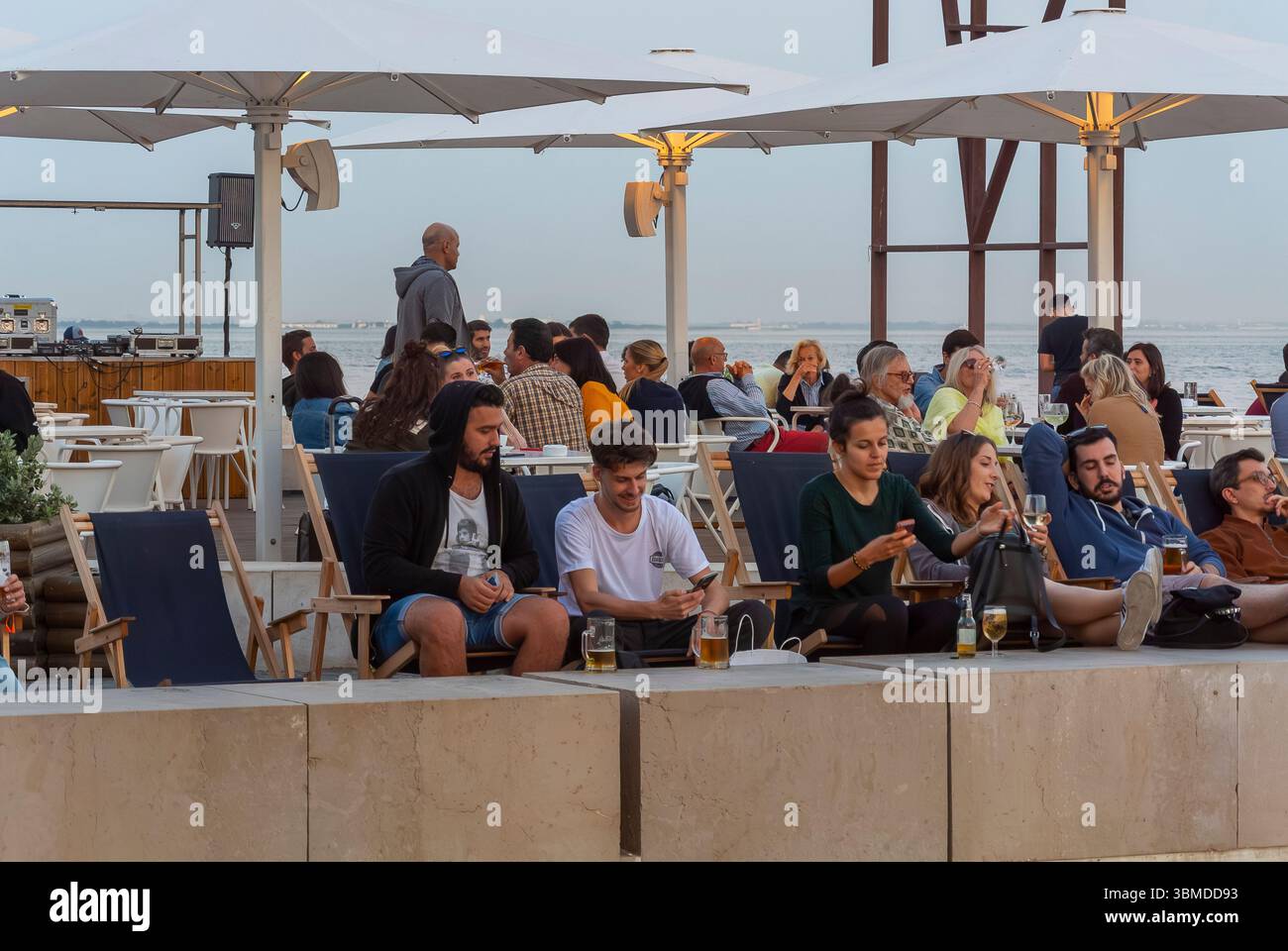 Lisbon, Portugal, Crowd People, Tourists, Sharing Drinks Outside ...