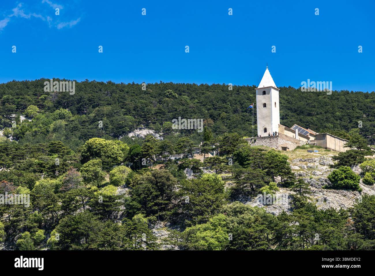 Church of St. John on a hill above the town of Baska on the island of ...