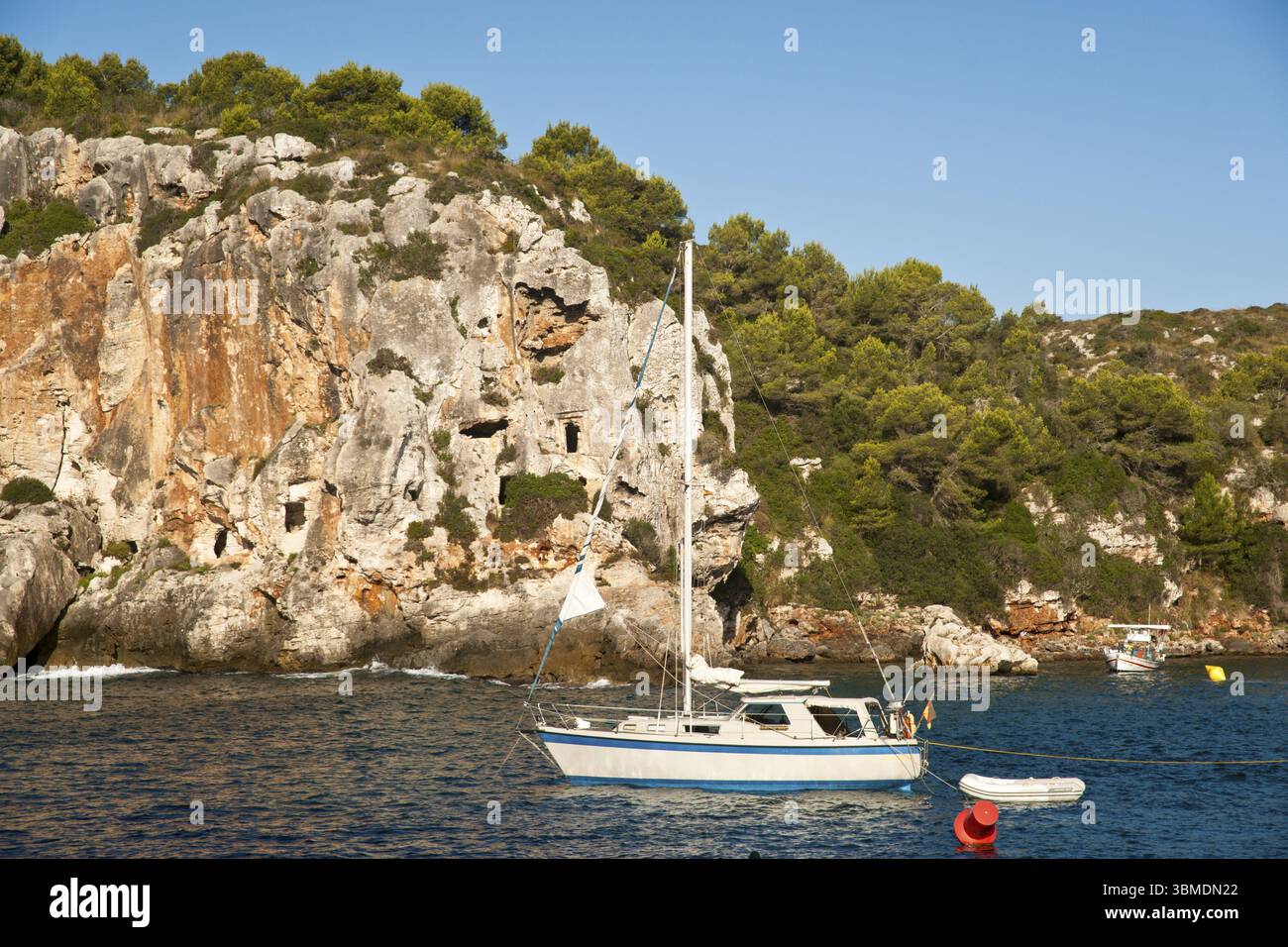 Prehistoric cliff dwellings, Cales Coves bay, Cami de Cavalls, GR223 ...