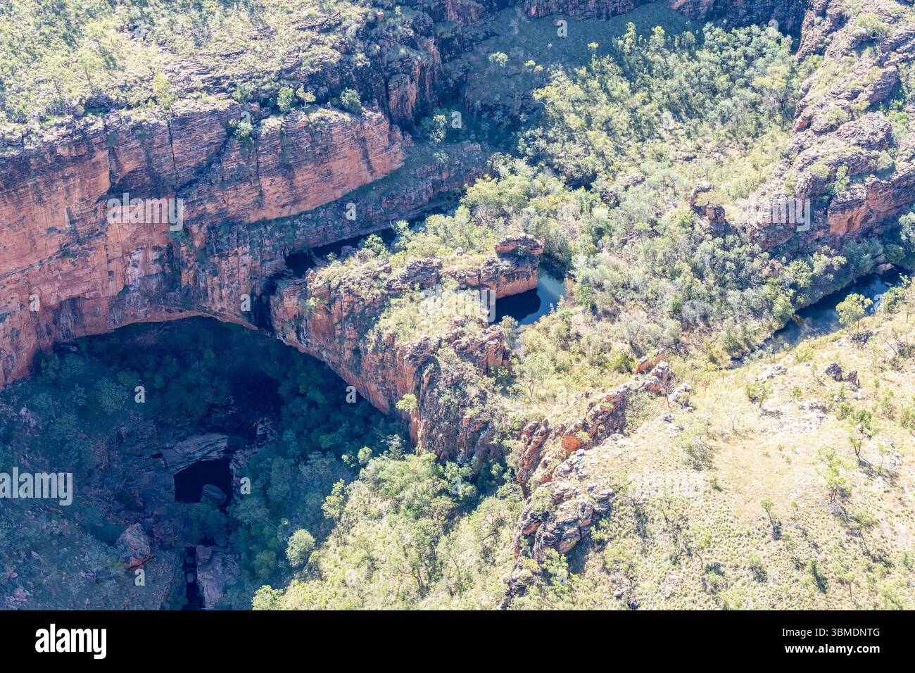 Kimberley landscape directly below flat-tp landforms fractured by ...