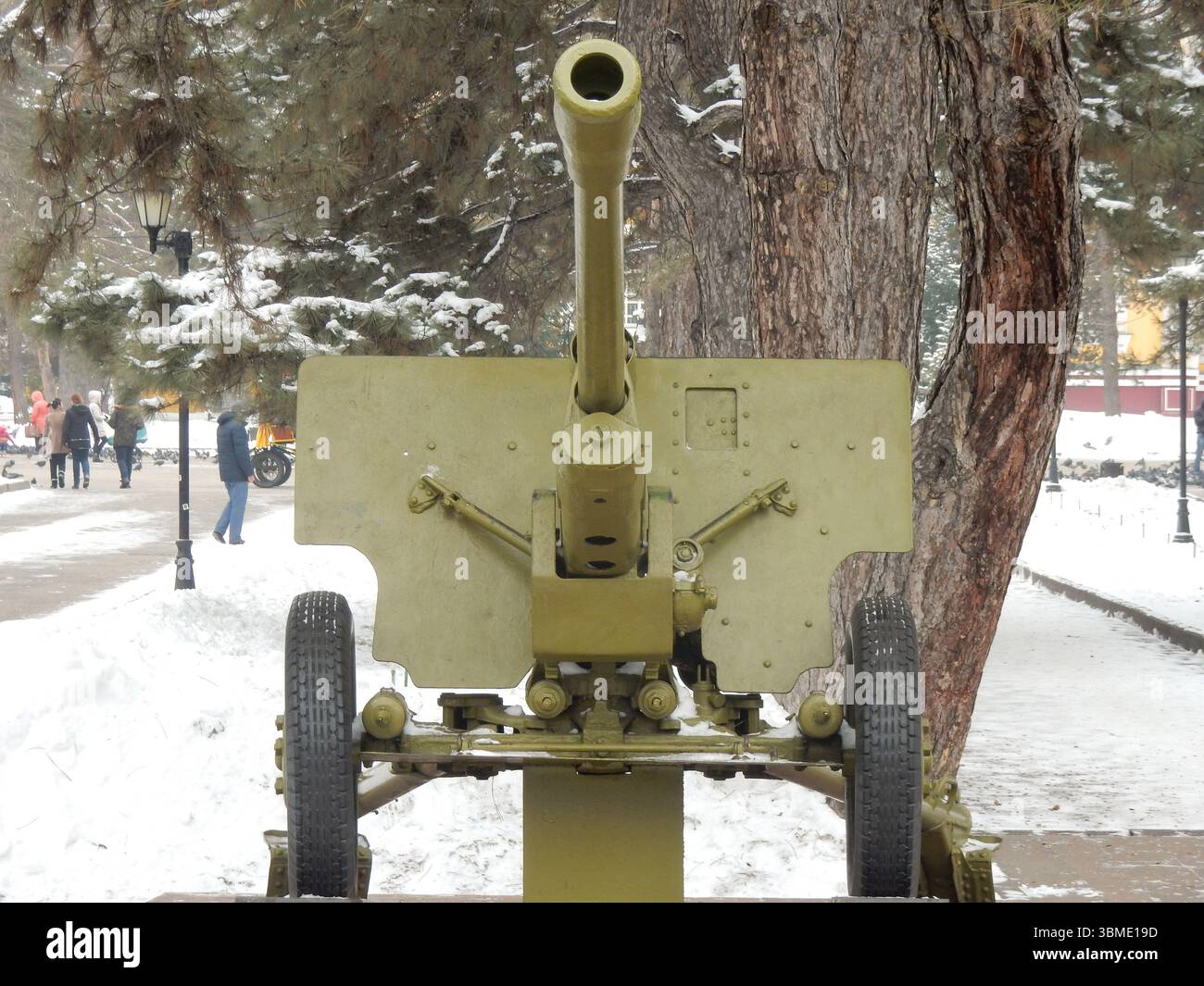 A Howitzer Gun and Statue in Paniflov Park , Almaty, Kazakhstan Stock ...