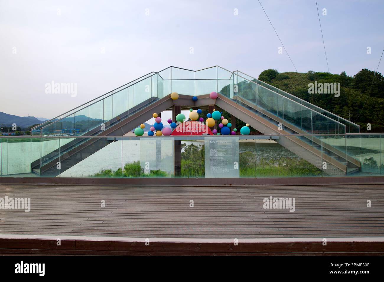Samcheok, South Korea - May 31st 2025: A modern glass bridge crossing a ...