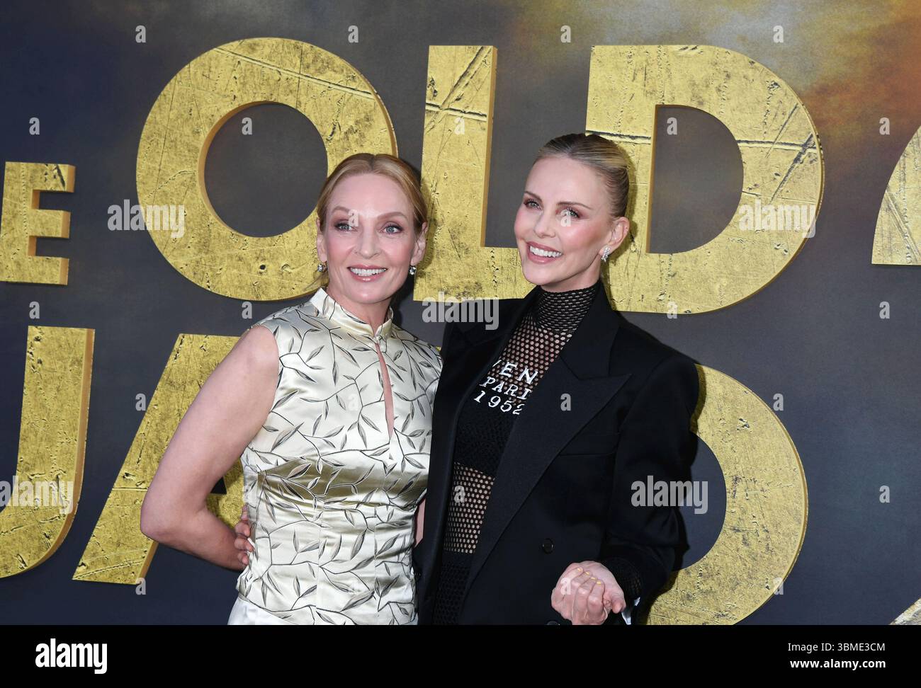 LOS ANGELES, CALIFORNIA - JUNE 25: (L-R) Uma Thurman and Charlize Theron attend the Los Angeles ...