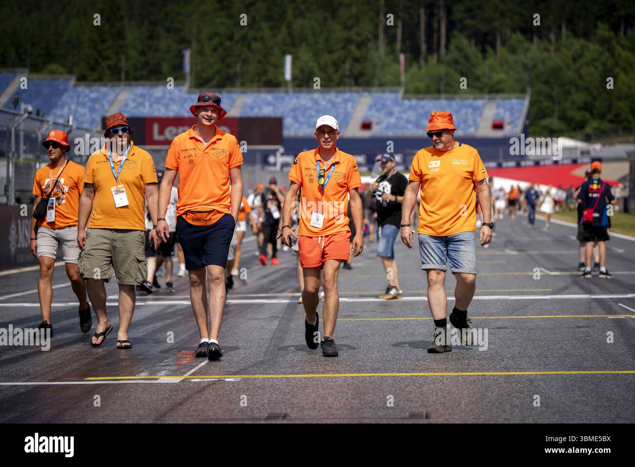 SPIELBERG - Racing fans walk on the Red Bull Ring race track ahead of ...
