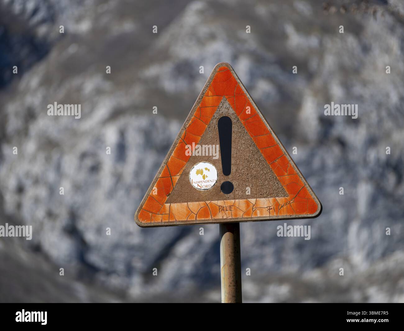 Weathered traffic sign with exclamation mark, Caution, Venzone, Friuli ...