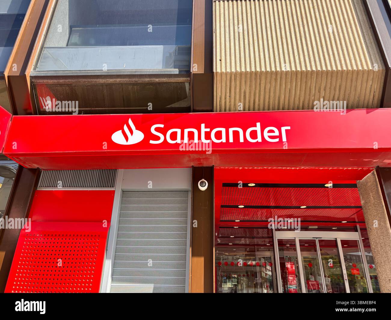 Alicante, Spain - June 24, 2025: Exterior view of Santander bank branch ...
