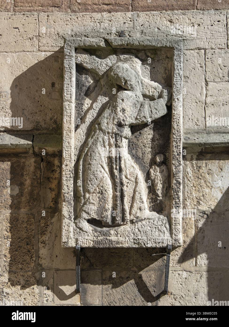 Stone relief of Christ carrying the cross on the facade of Brunswick ...