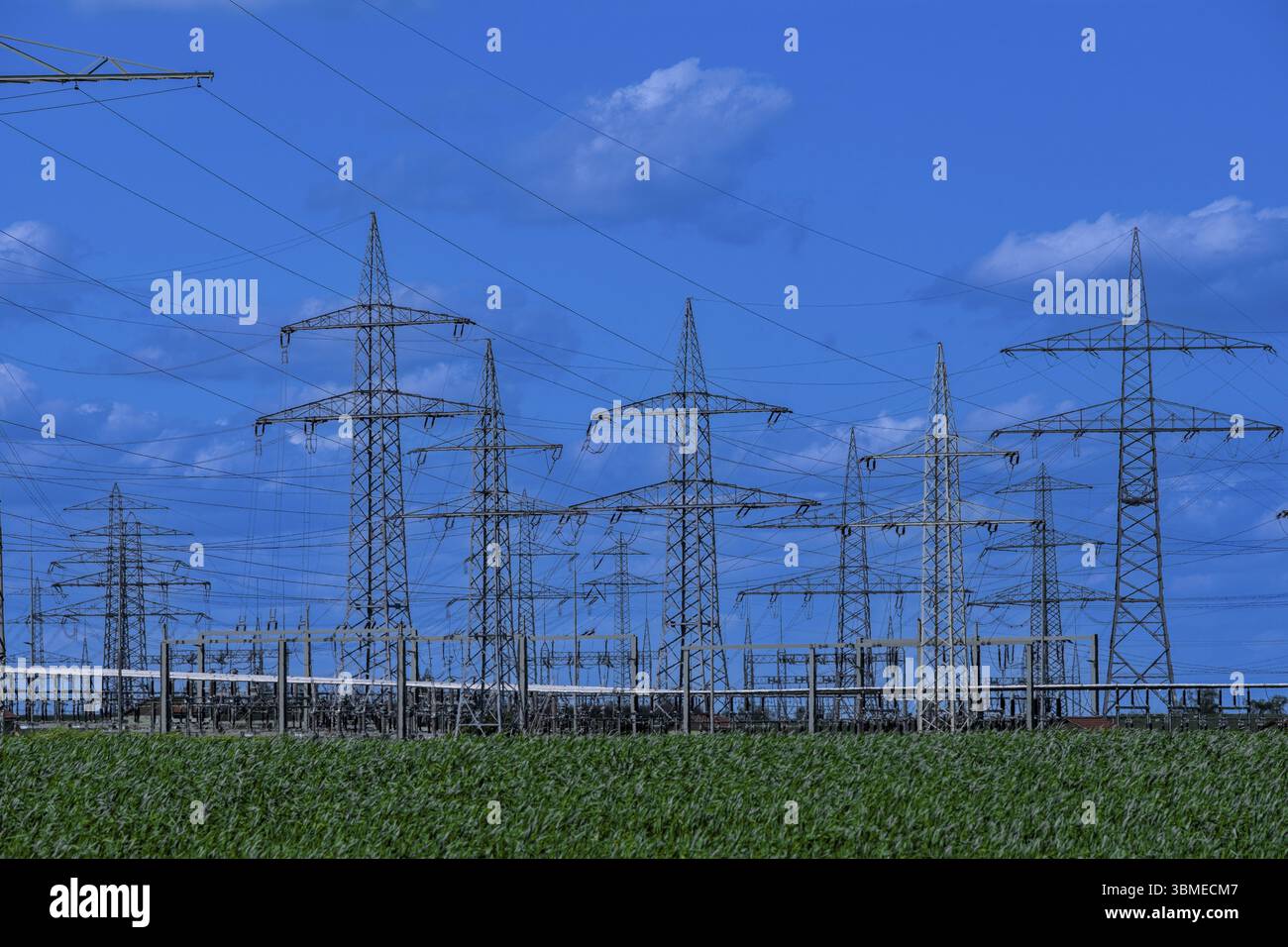 Power pylons with high-voltage lines at the Avacon substation in ...