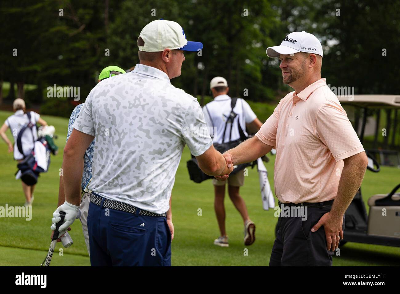 Jason Kokrak of Smash GC shakes hands with am-am participant during the ...