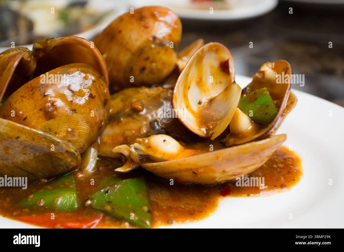 stir fried clams with black bean sauce, chinese restaurant in Hong Kong ...
