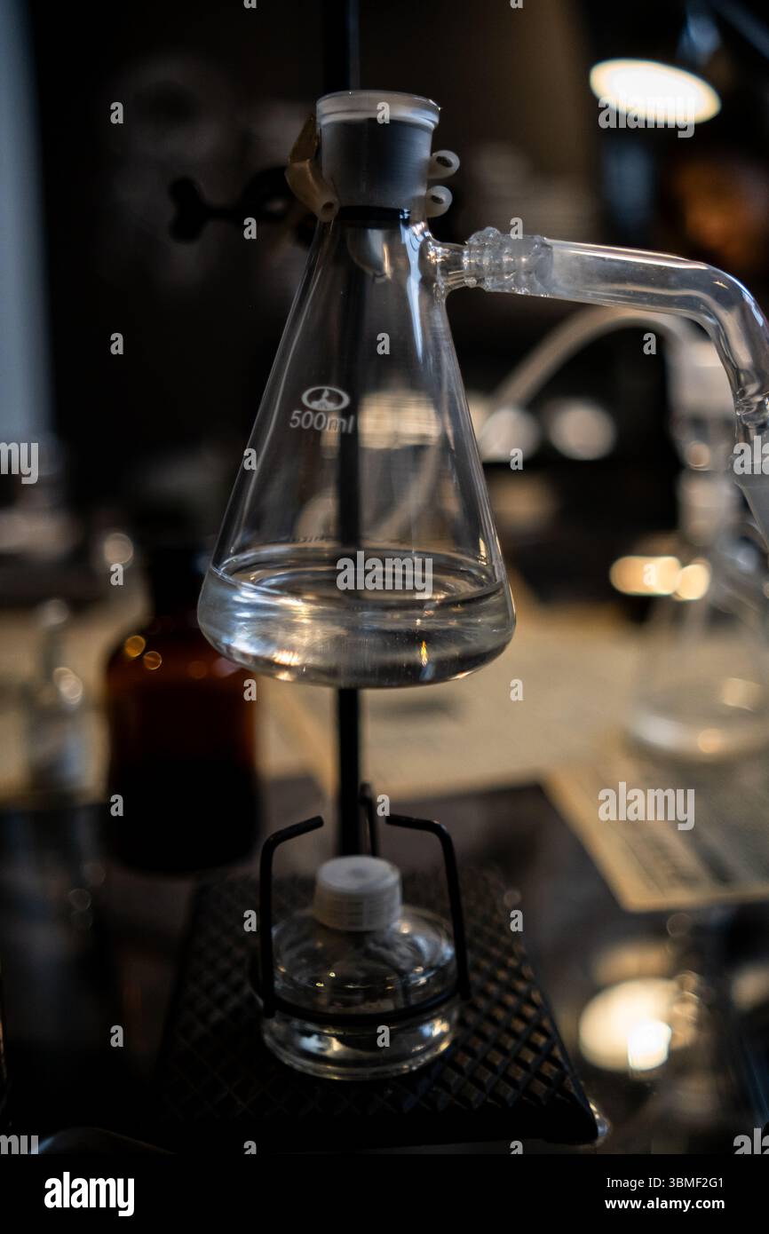 Clear Glass Flask on a Stand Illuminated by Soft Light in a Laboratory ...