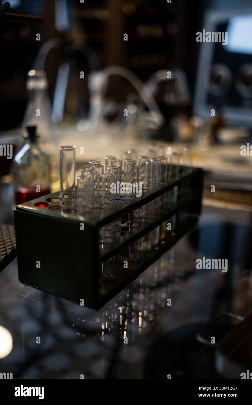 Laboratory Experiment With Glass Test Tubes and Equipment on a ...