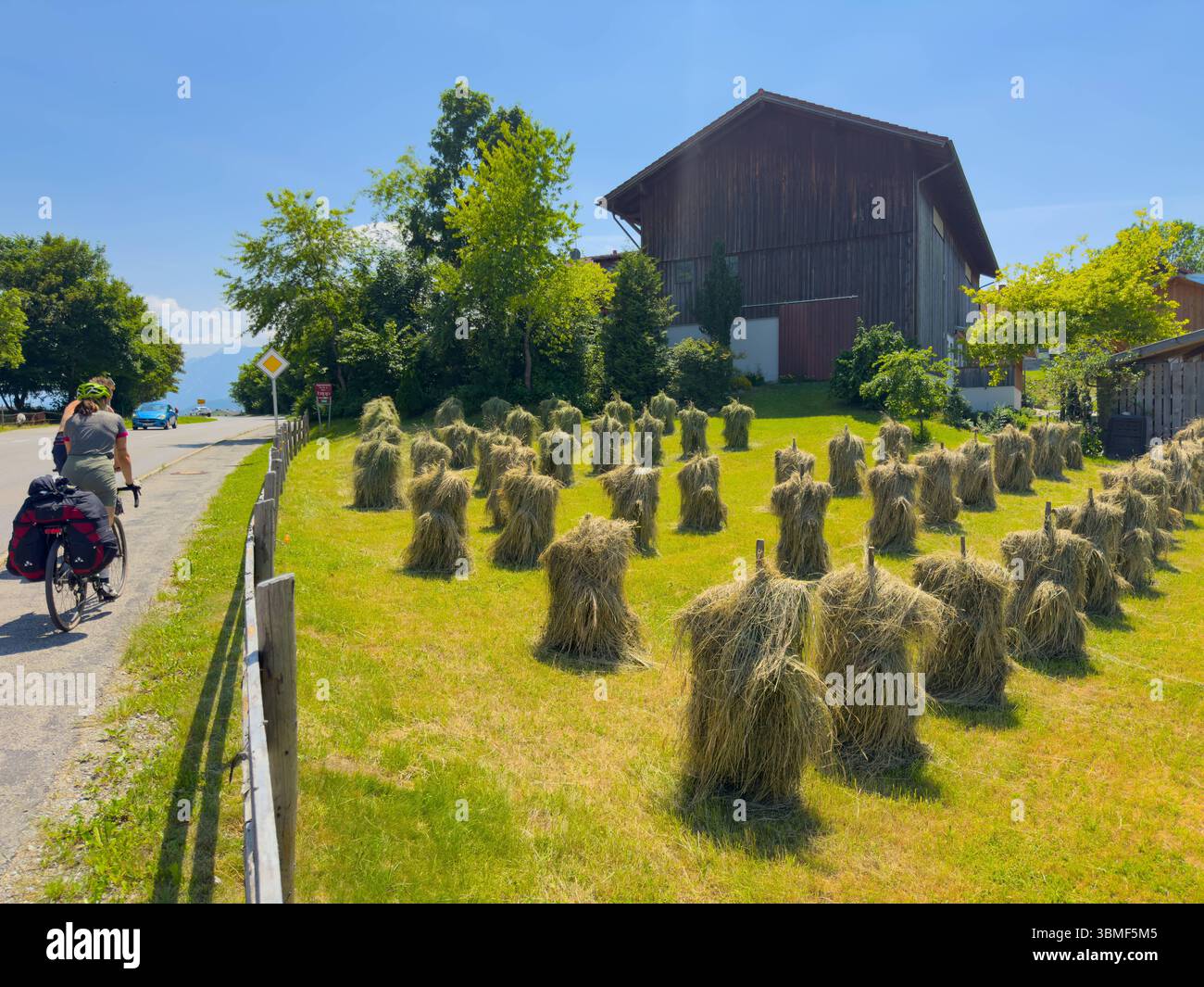 Scenic rural landscape with freshly harvested hay bales at June 18 ...