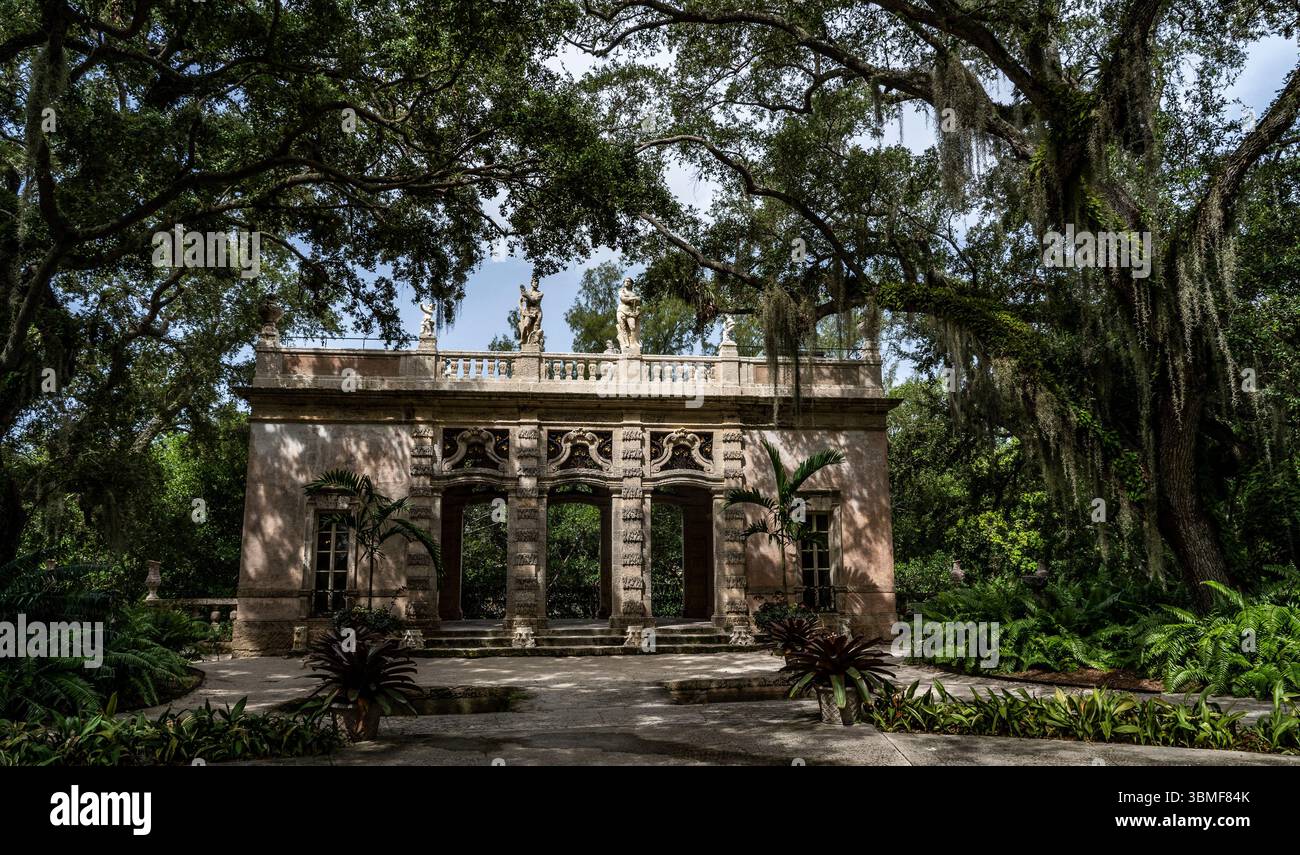 A historic garden pavilion adorned with classical sculptures ...