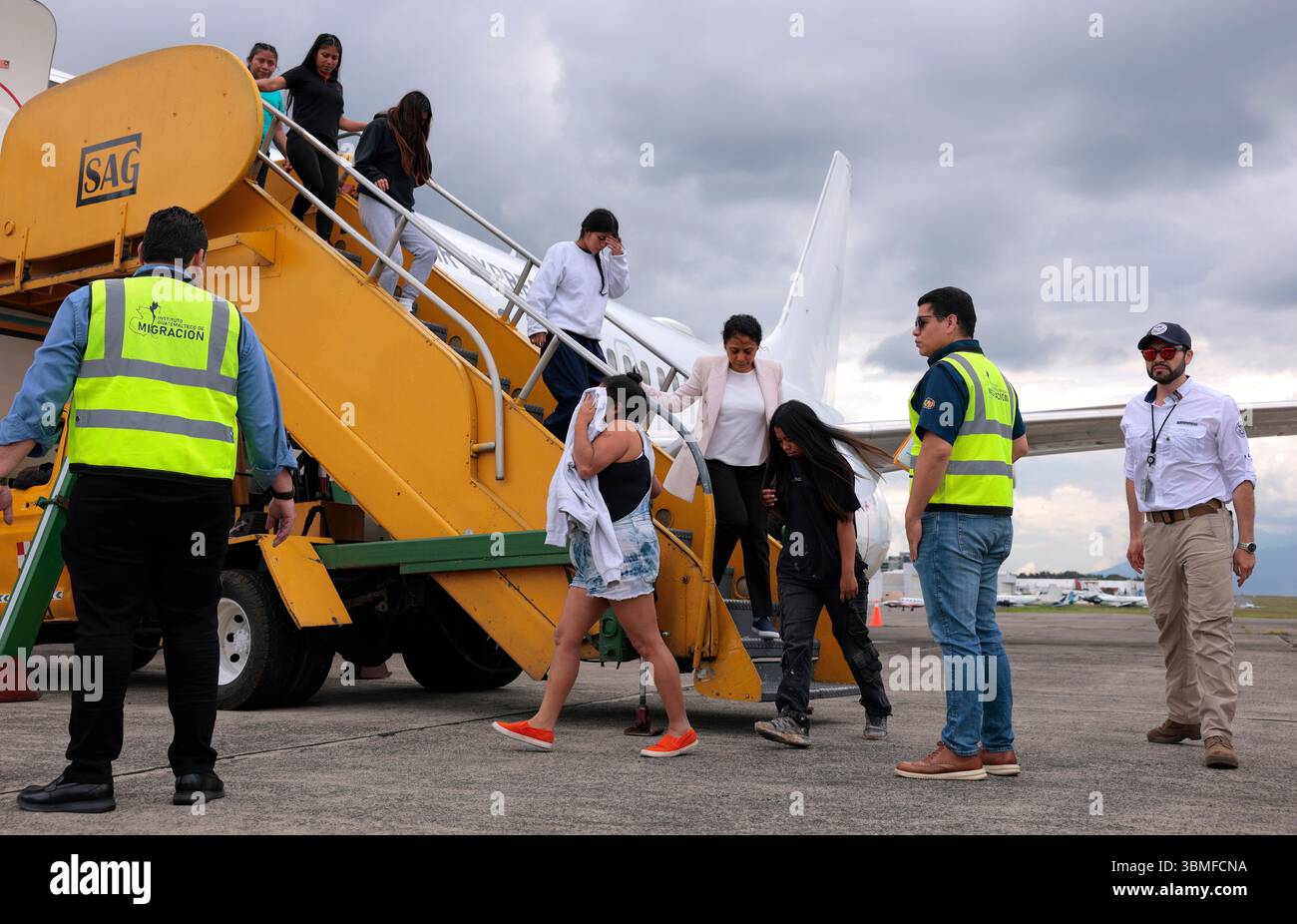People deported from the United States disembark a repatriation flight ...