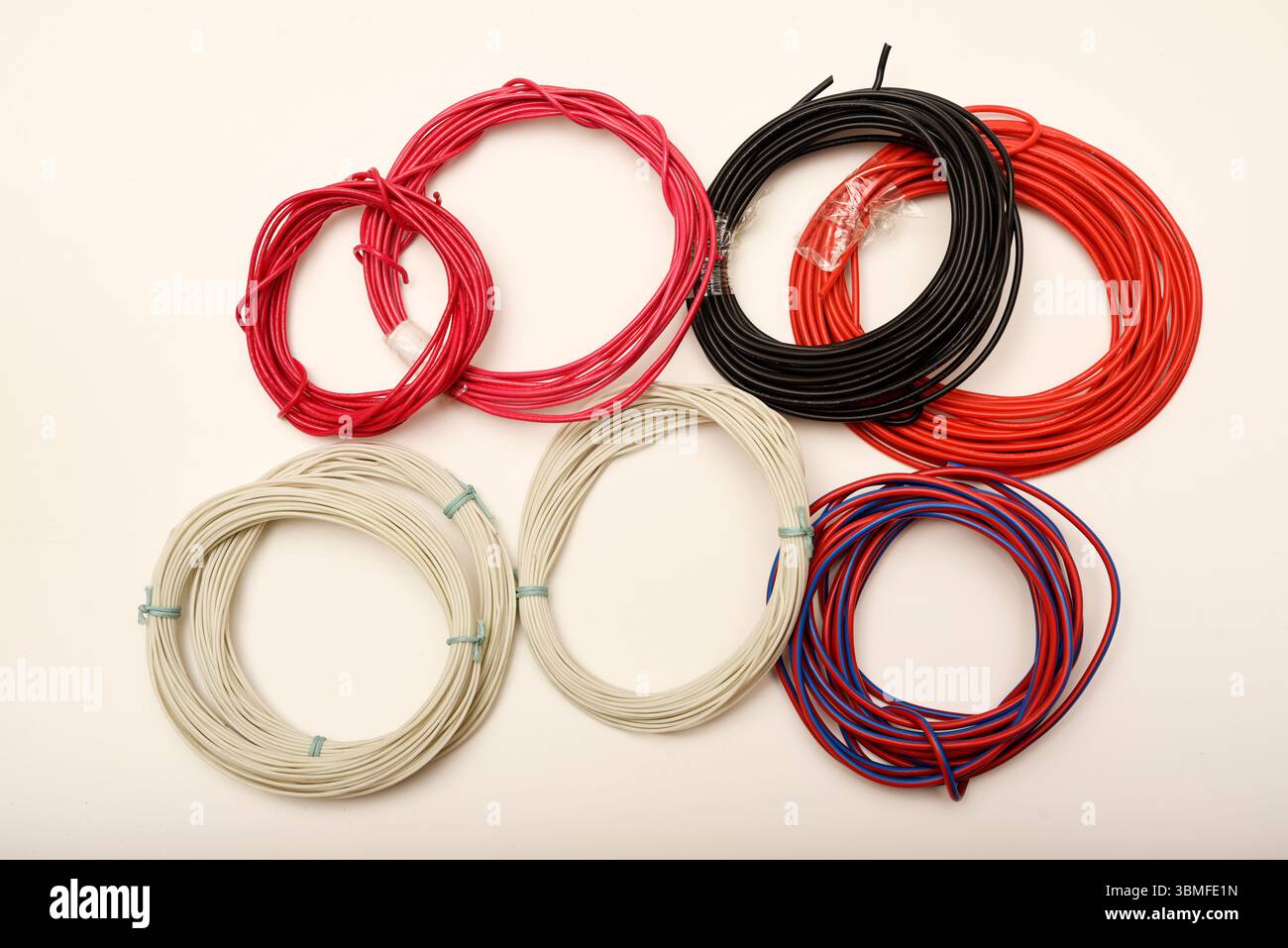Bundles of copper connecting wires in rubber insulation. Multicolored ...