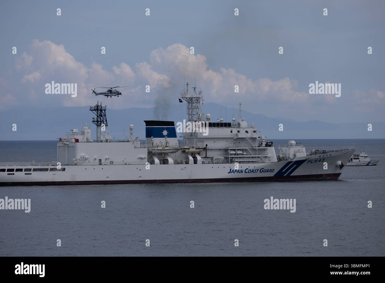 The Japan Coast Guard Patrol Vessel Asanagi (PLH-43), a Super Puma EC ...