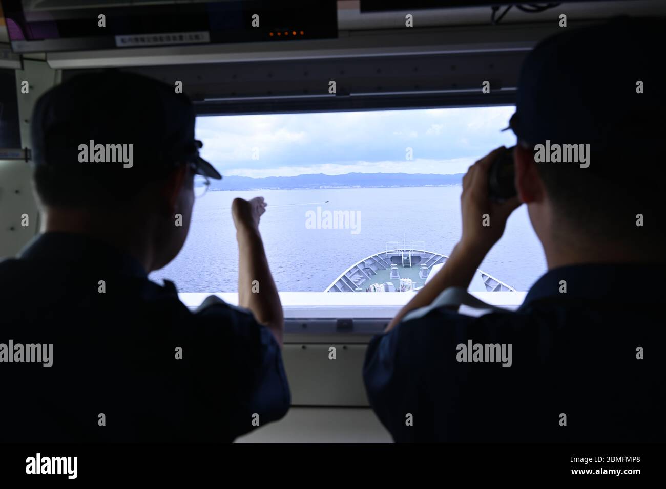 Japan Coast Guard members aboard the Japan Coast Guard Patrol Vessel ...