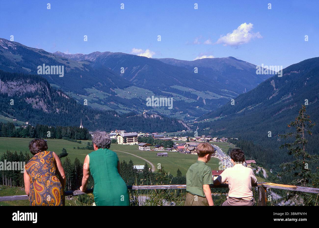 1960s Austria - Visitors admiring a scenic view of Matrei am Brenner ...