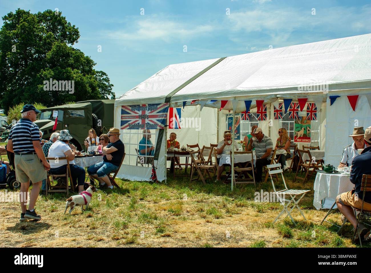 People enjoying a summer day at a British-themed 1940's tea room ...