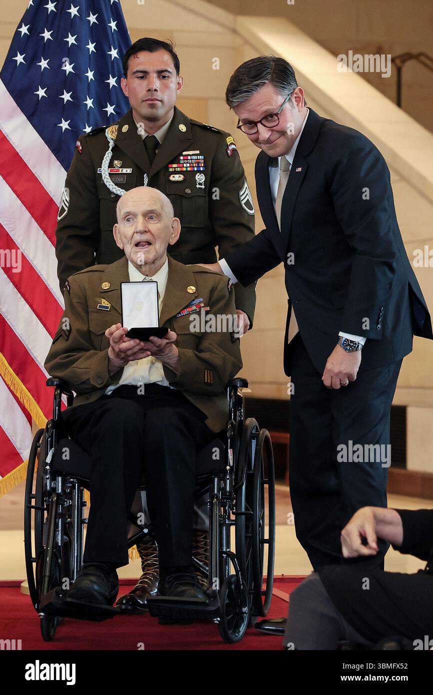 Speaker of the House Mike Johnson (R-LA) presents D-Day veteran and ...