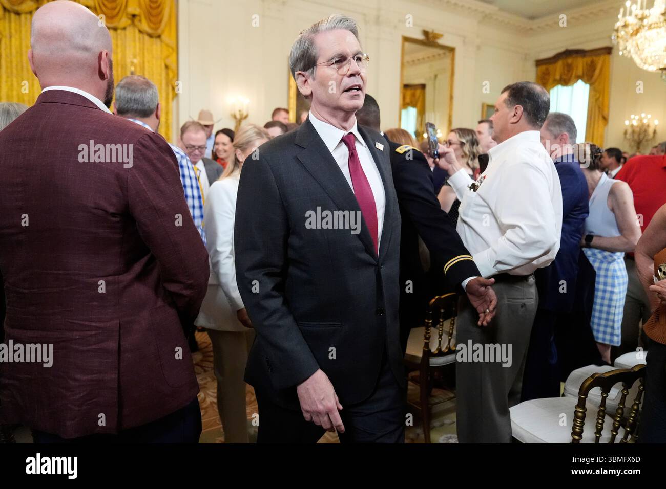 Treasury Secretary Scott Bessent departs an event to promote President ...