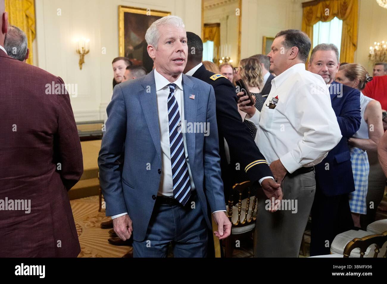 Energy Secretary Chris Wright departs an event to promote President ...