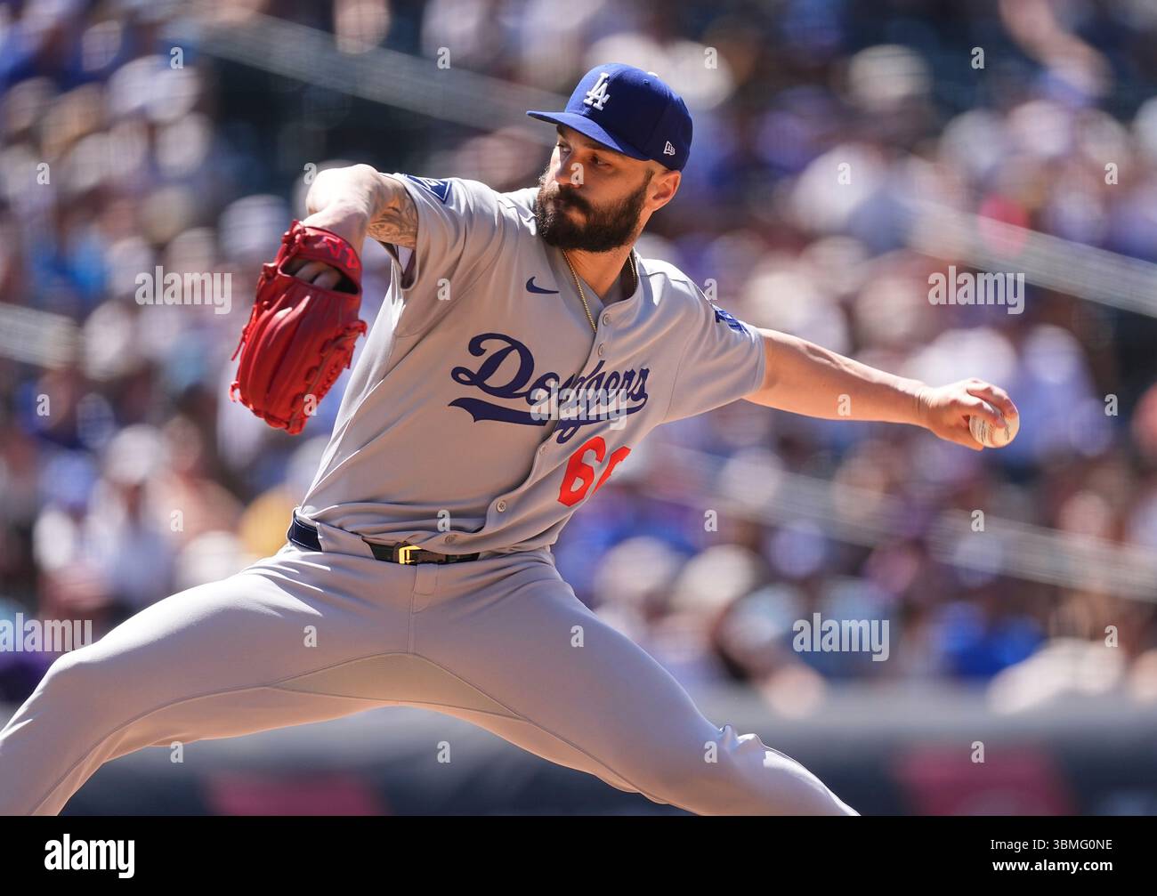Los Angeles Dodgers relief pitcher Tanner Scott works against the ...
