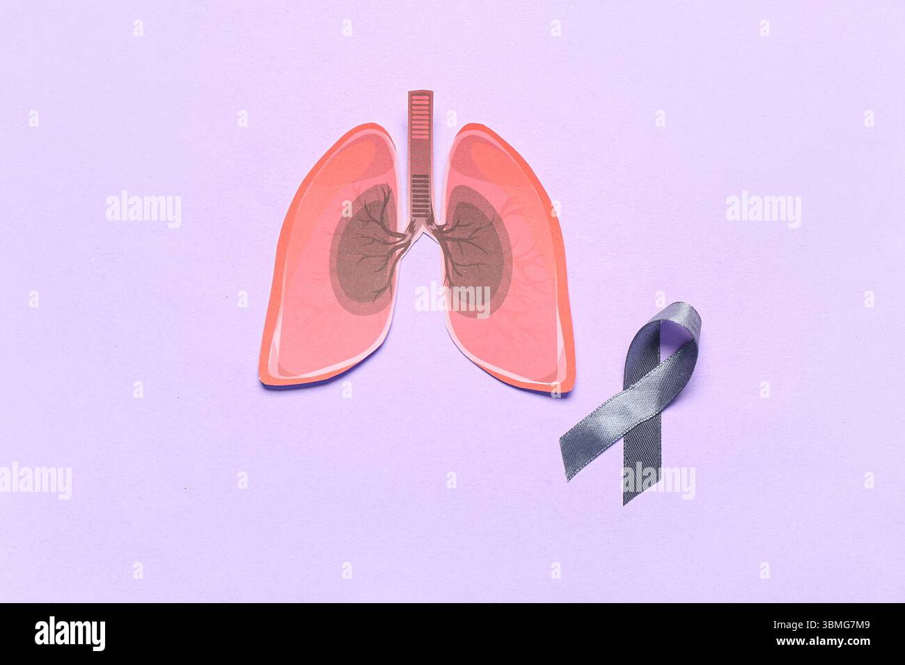 Paper lungs with grey ribbon on purple background Stock Photo - Alamy