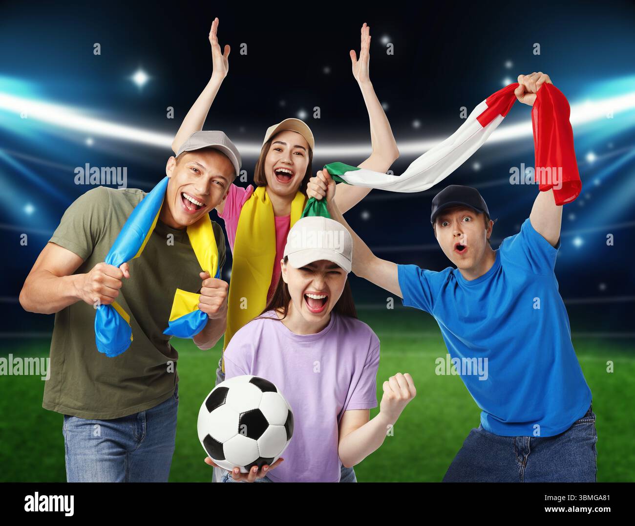 Excited football fans with flags on stadium Stock Photo - Alamy