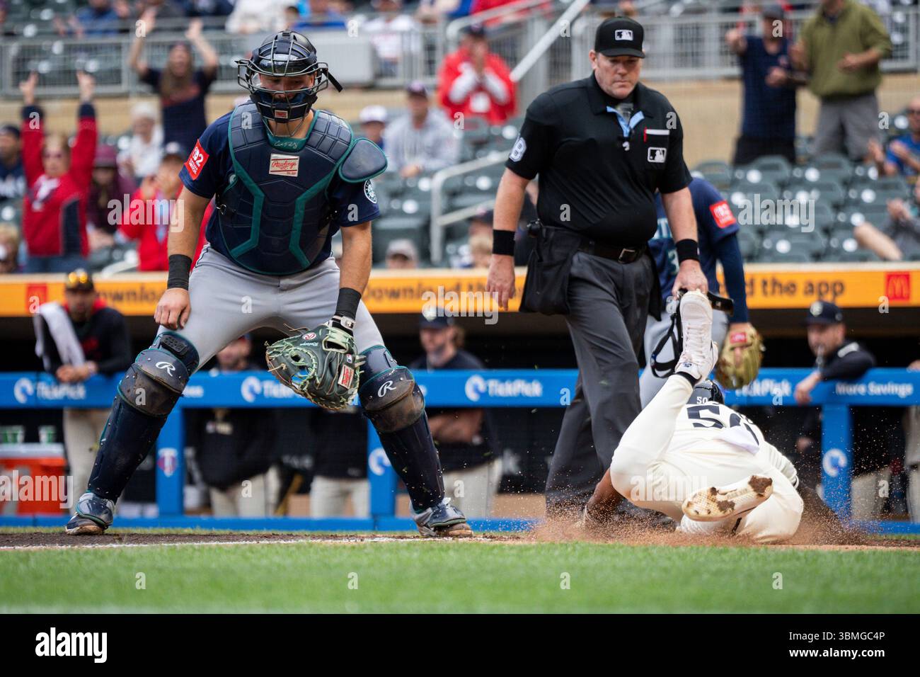 Minnesota Twins outfielder Willi Castro (50) slides safely home against ...