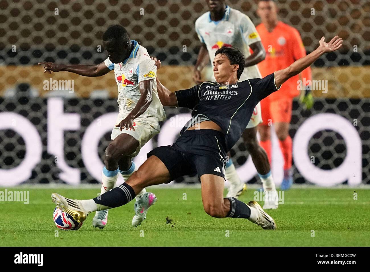 Real Madrid's Gonzalo Garcia and Red Bull Salzburg's Soumaila Diabate ...
