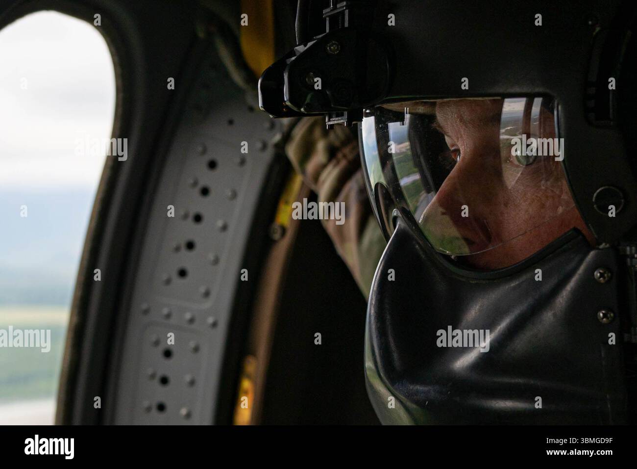 U.S. Army Sgt. Kurt Miller, Alaska Army National Guard UH-60L Black ...