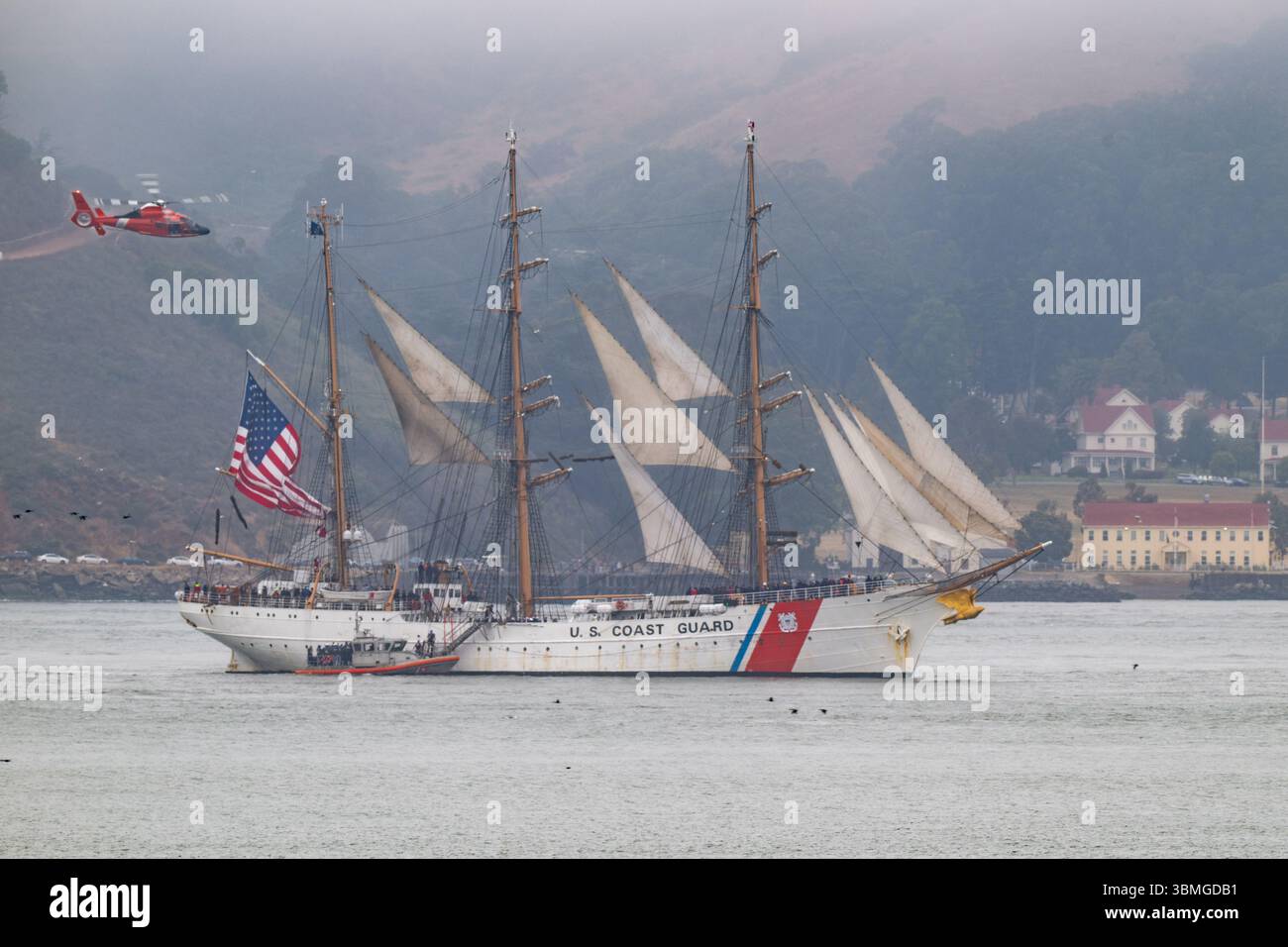 The U.S. Coast Guard Cutter Barque Eagle (WIX-327) sails in front of ...
