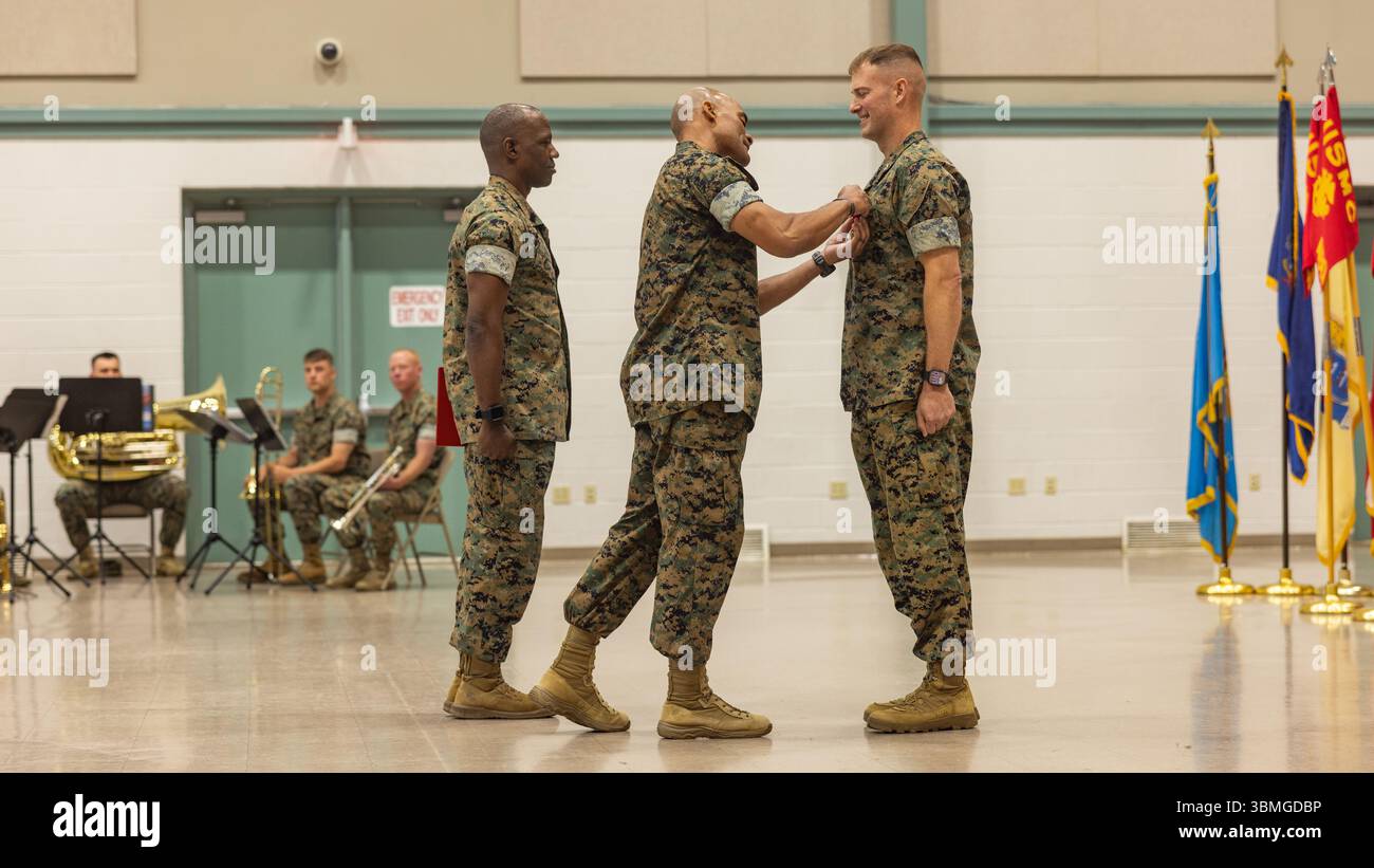 U.S. Marine Corps Brig. Gen. David C. Hyman awards Col. Warren C. Cook ...