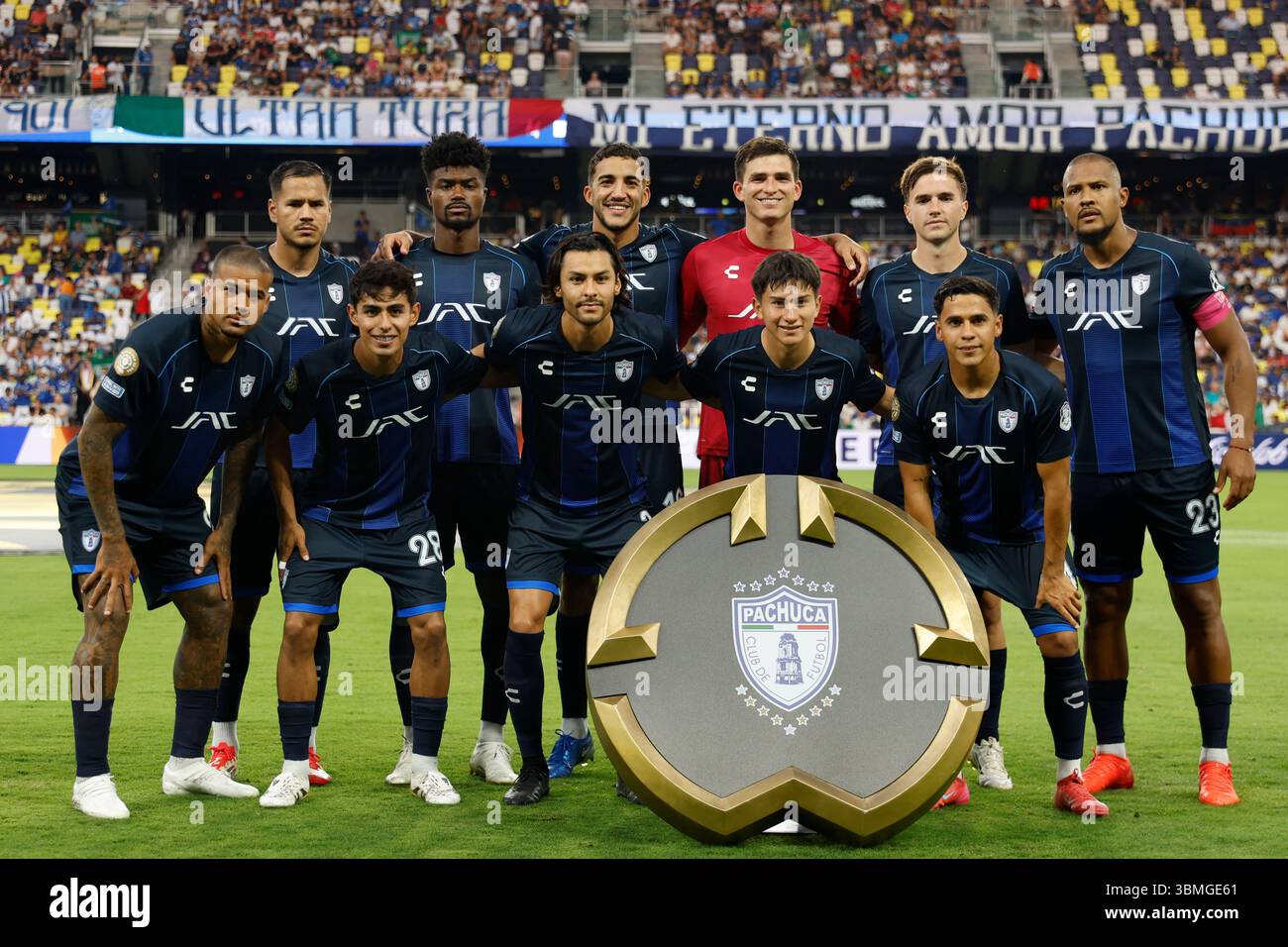 Pachuca's starting players pose for a team photo at the beginning of a ...
