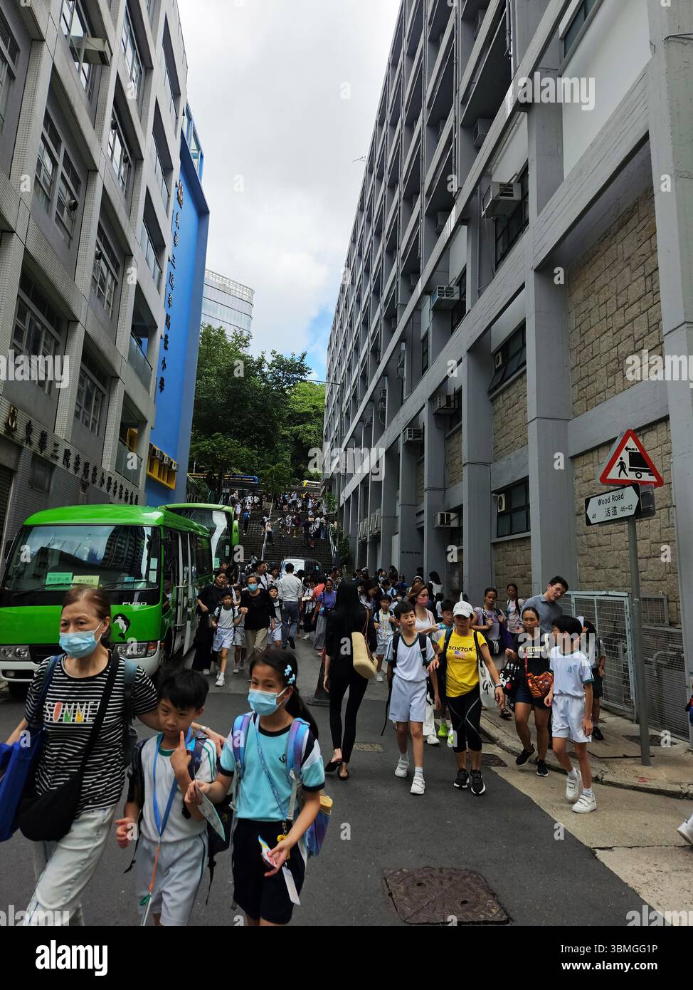 Hong Kong Wan Chai Primary School Dismissal Street Crowd Scene Stock ...