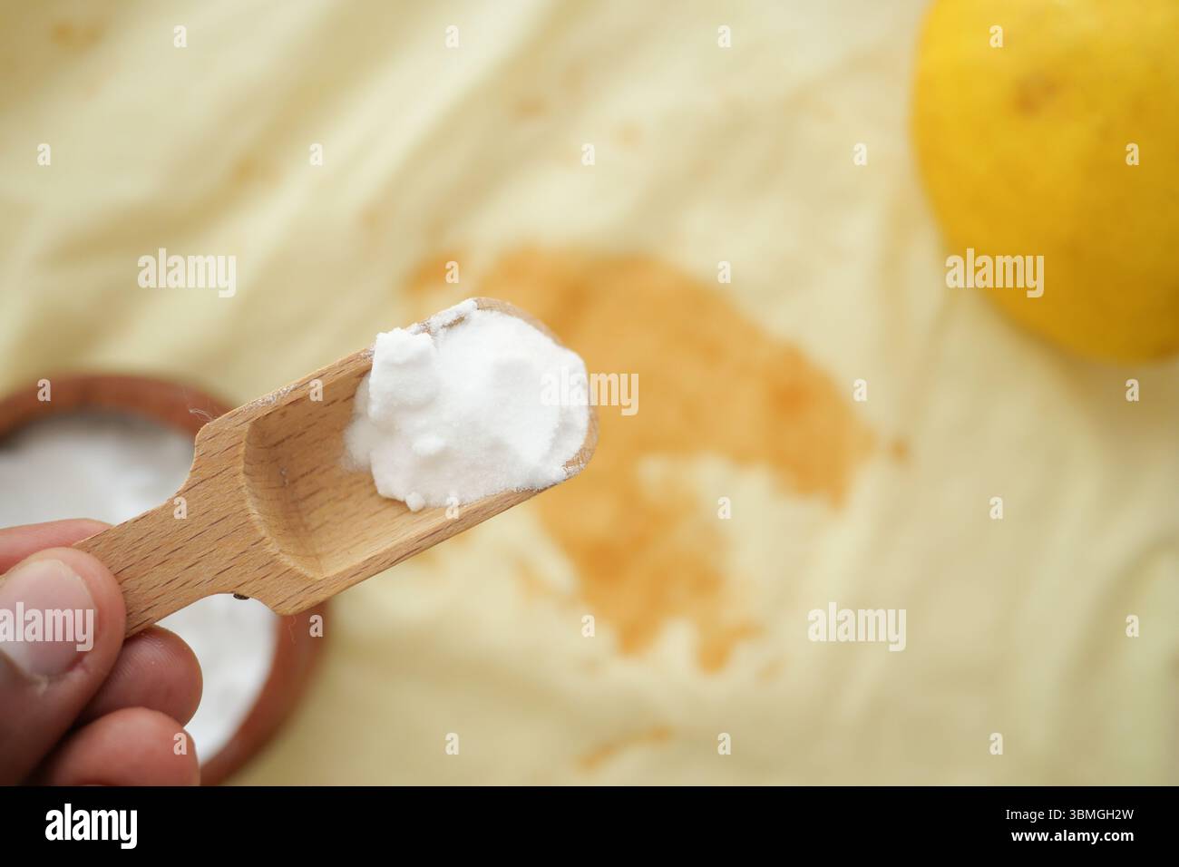 Baking soda and lemon for removing stain form cloth Stock Photo - Alamy