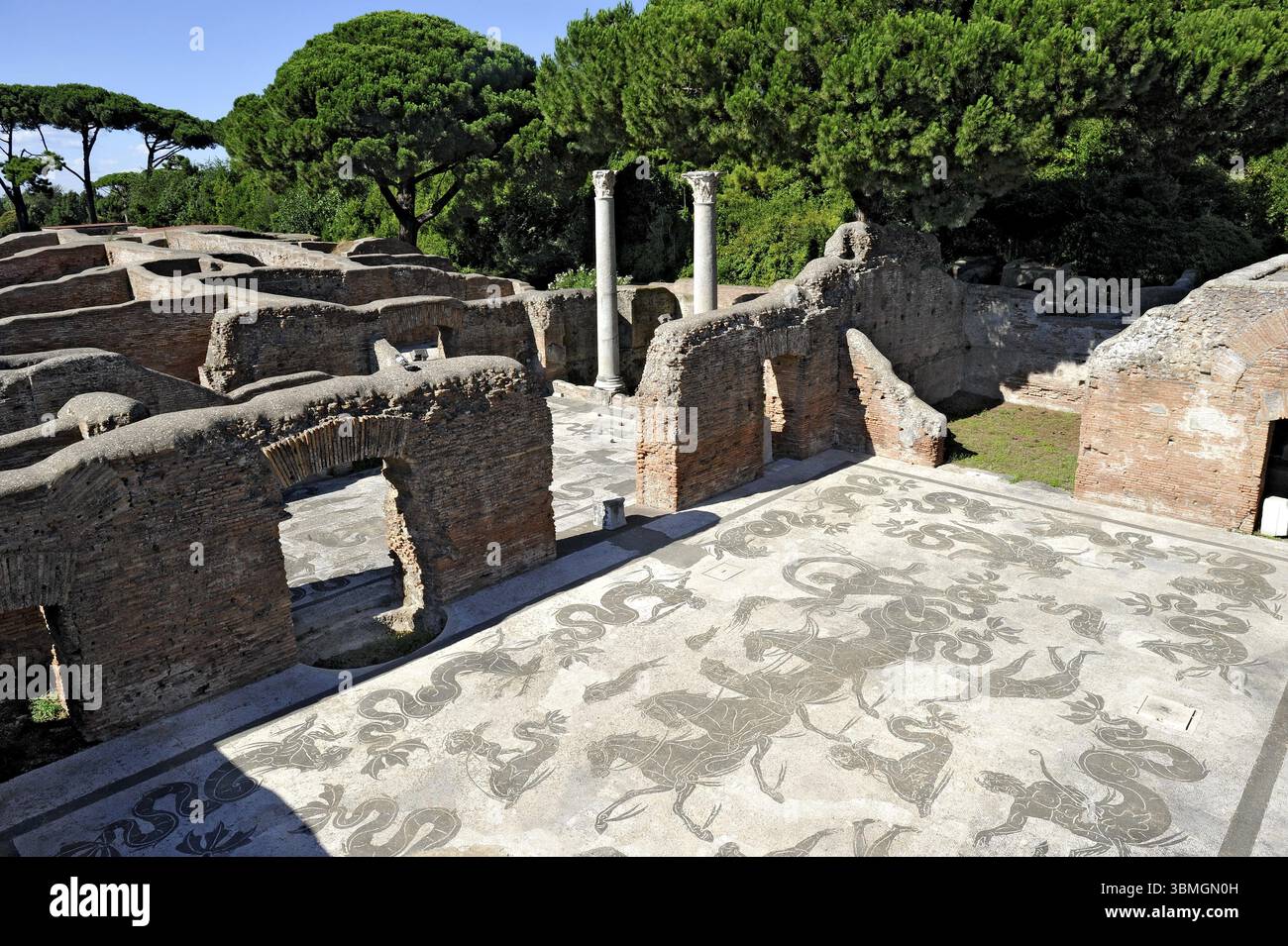 Ruins with mosaics on the floor of the Terme di Nettuno, thermal baths ...