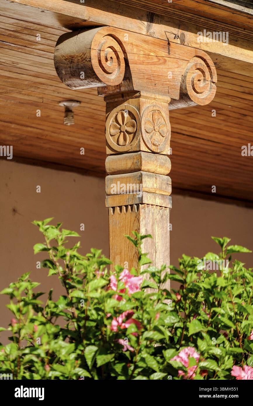 Carved wooden column in the cloister, San Juan Cotzal, department of ...