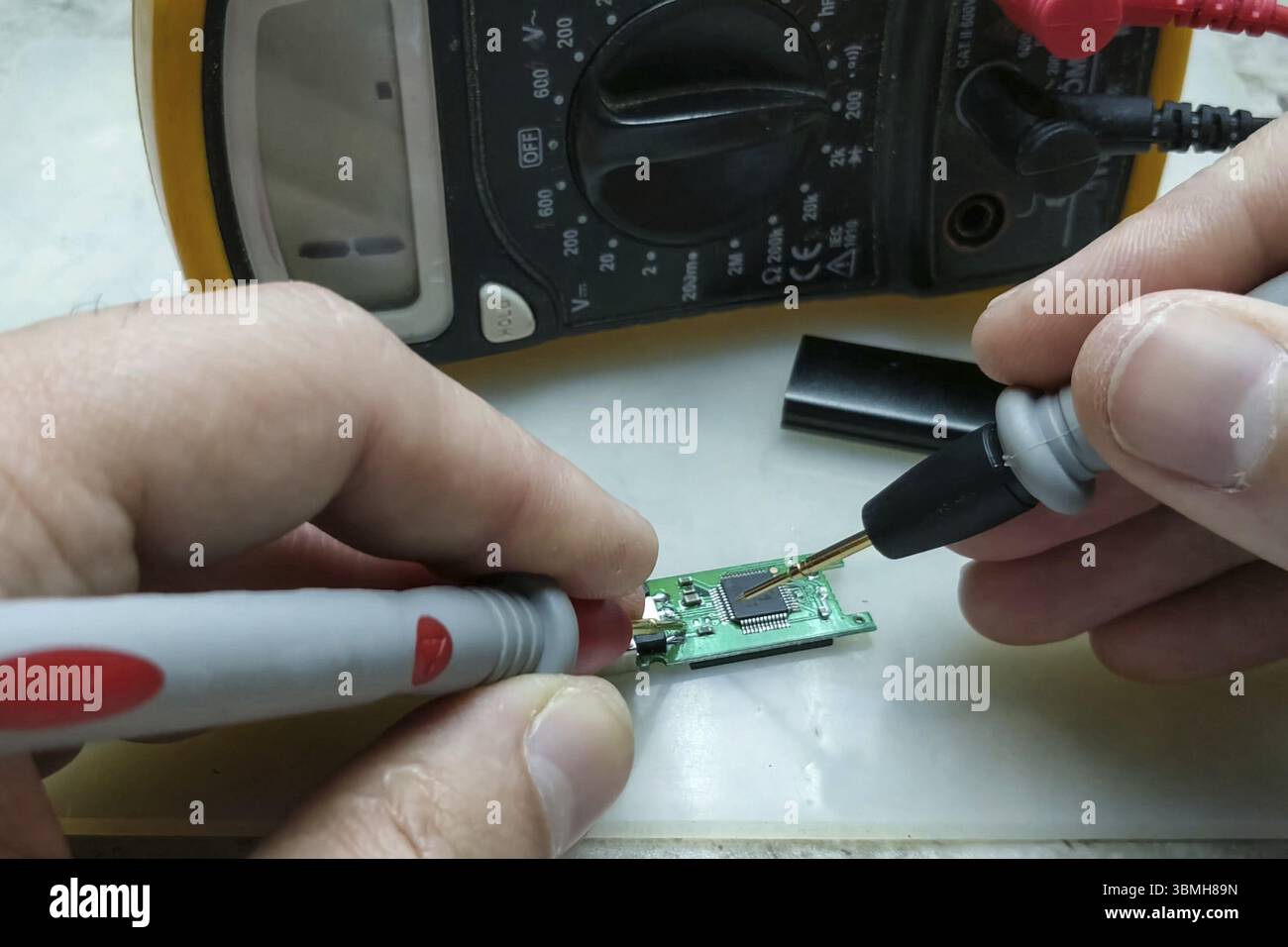 Repair of electronics and computer equipment. Multimeter Stock Photo ...