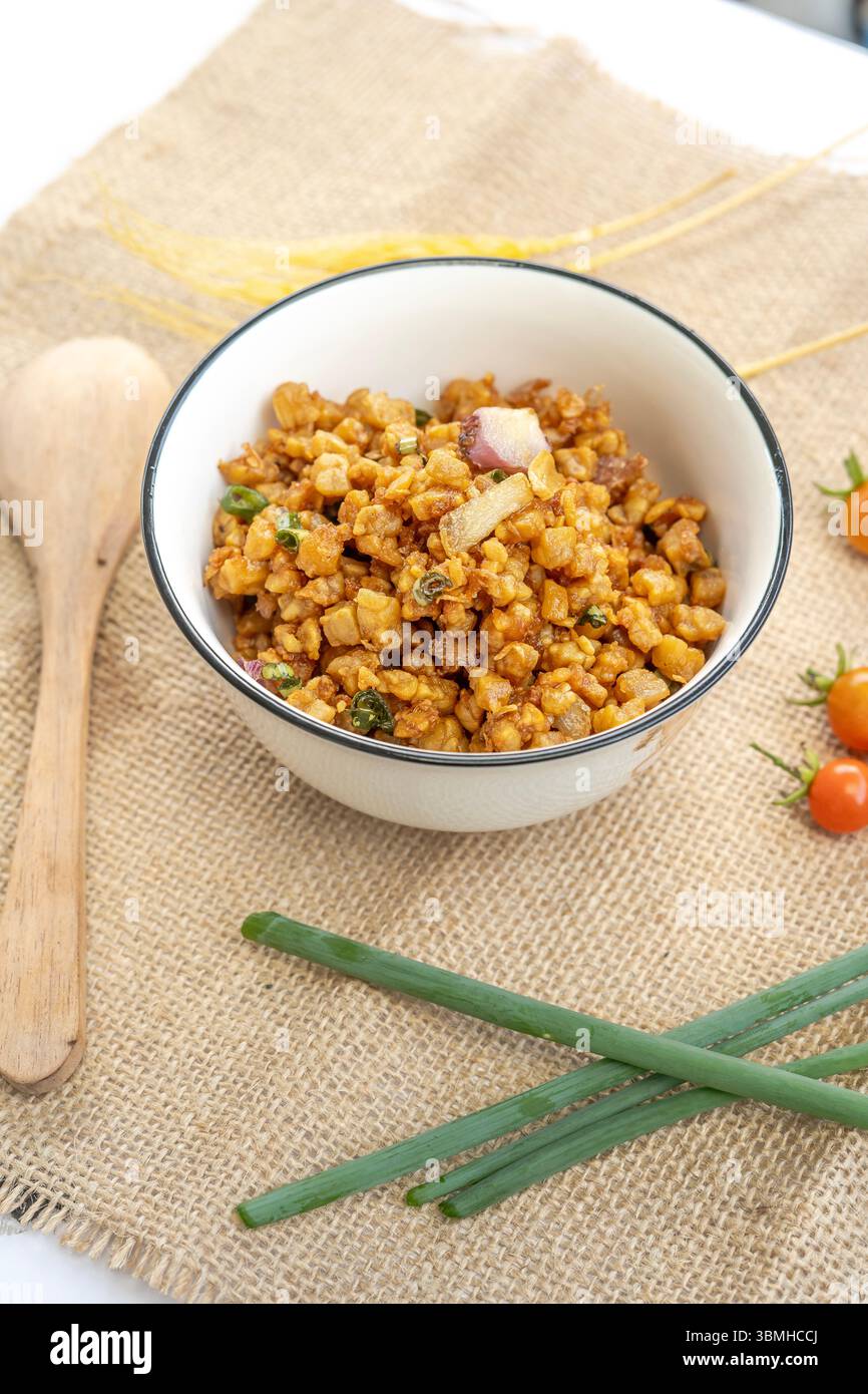Orek tempe or Sauteed Tempeh is a typical Indonesian cuisine with herbs ...