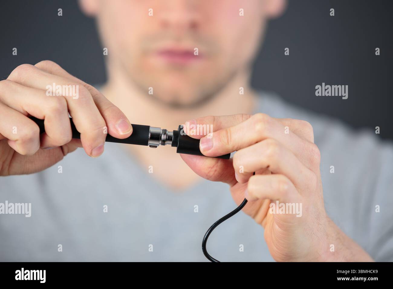 Man insert ethernet cable hi-res stock photography and images - Alamy