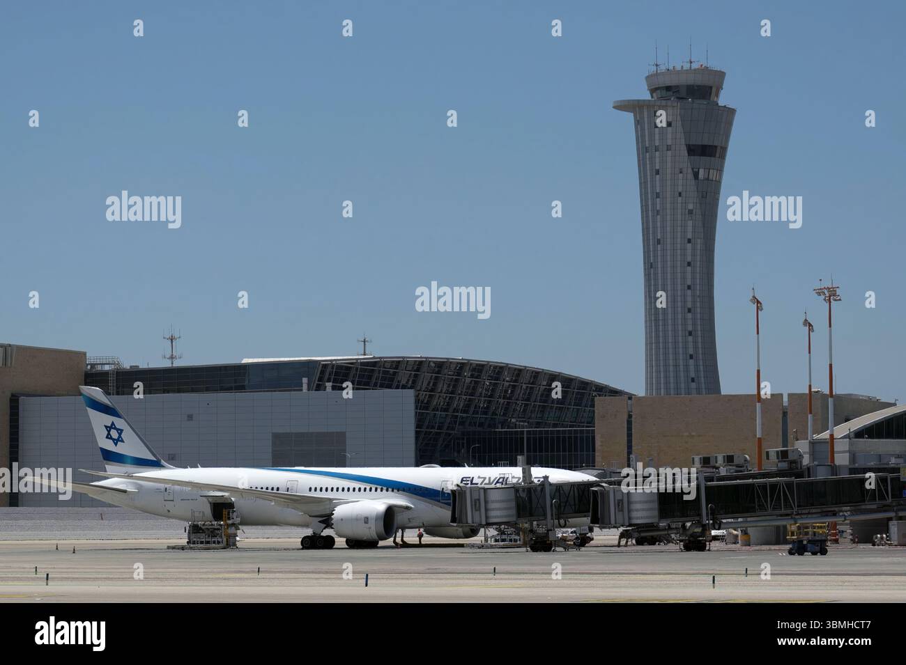 A Boeing 777 airplane of EL AL airlines parks at the gate after ...