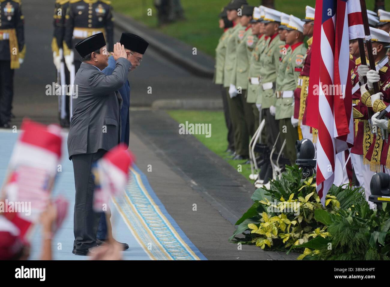 Indonesian President Prabowo Subianto, front, and Malaysian Prime ...