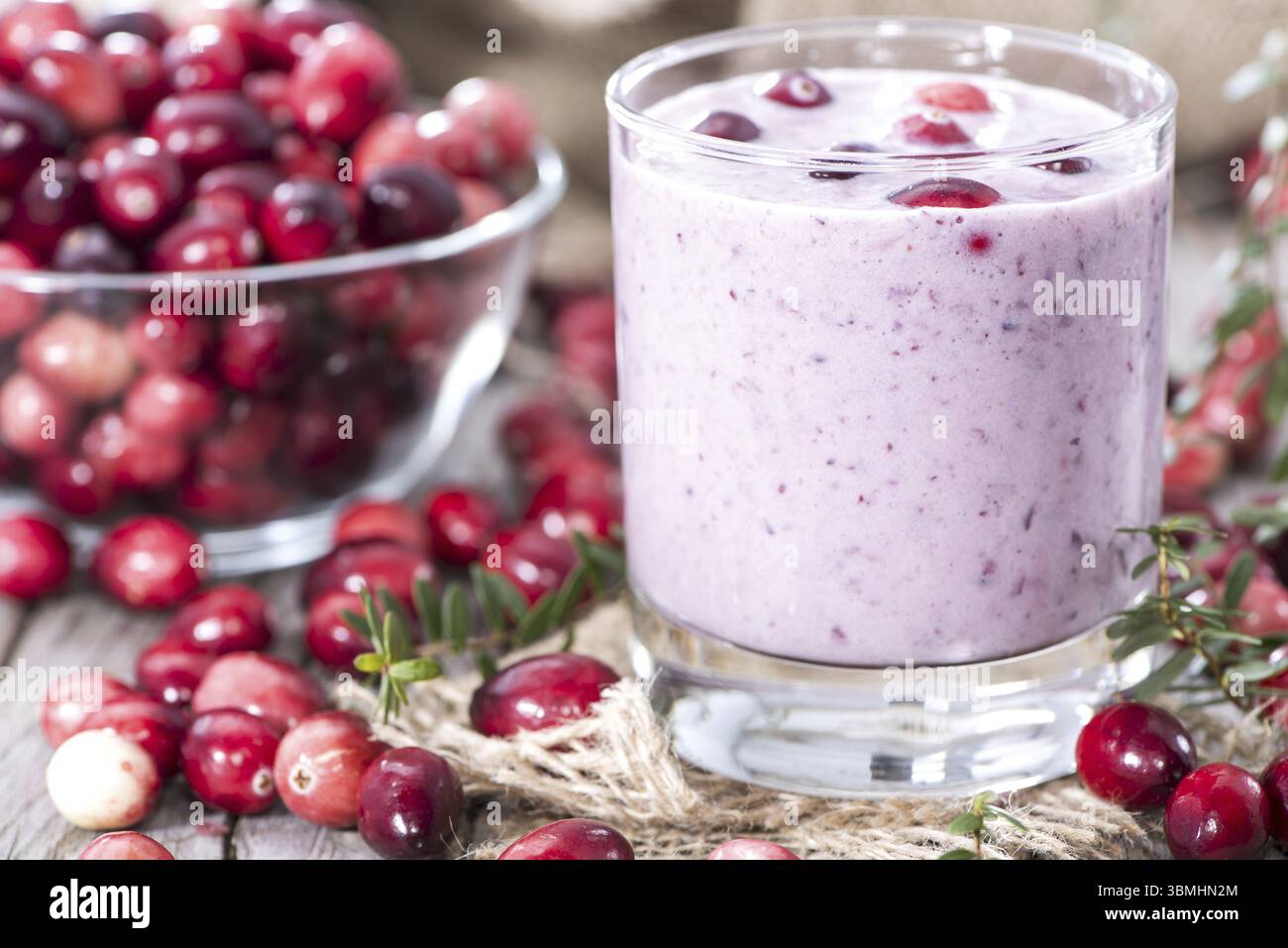 Cranberry Milkshake with fresh fruits Stock Photo - Alamy