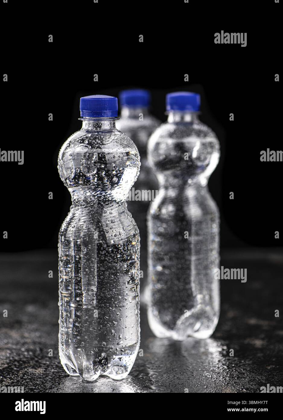 Bottles of chilled sparkling water as detailed close up shot Stock ...
