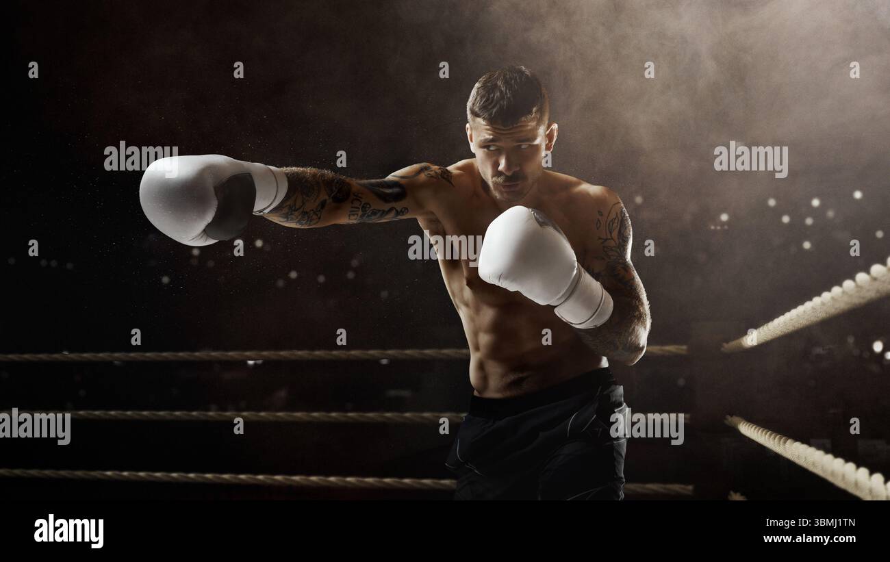 Tattooed boxer with white gloves strikes forward with power on a 3D ...